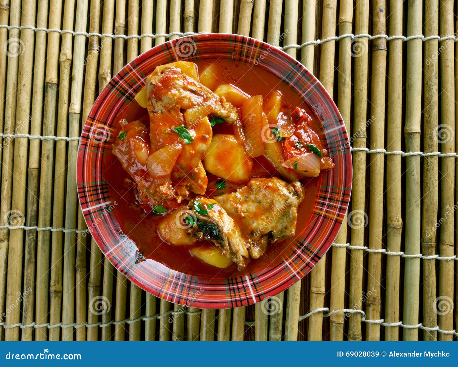 Filipino Chicken Adobo On Gray Plate On Concrete Backdrop. Filipino ...