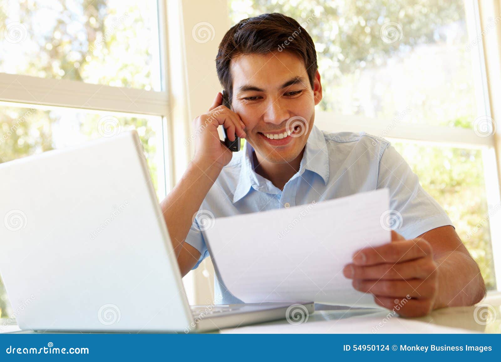 Filipino Man Working at Home Stock Photo - Image of cell, inside: 54950124