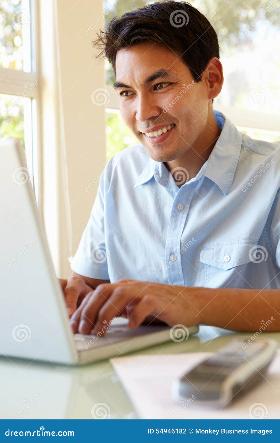 Filipino Man Working on Laptop Stock Photo - Image of indoors ...