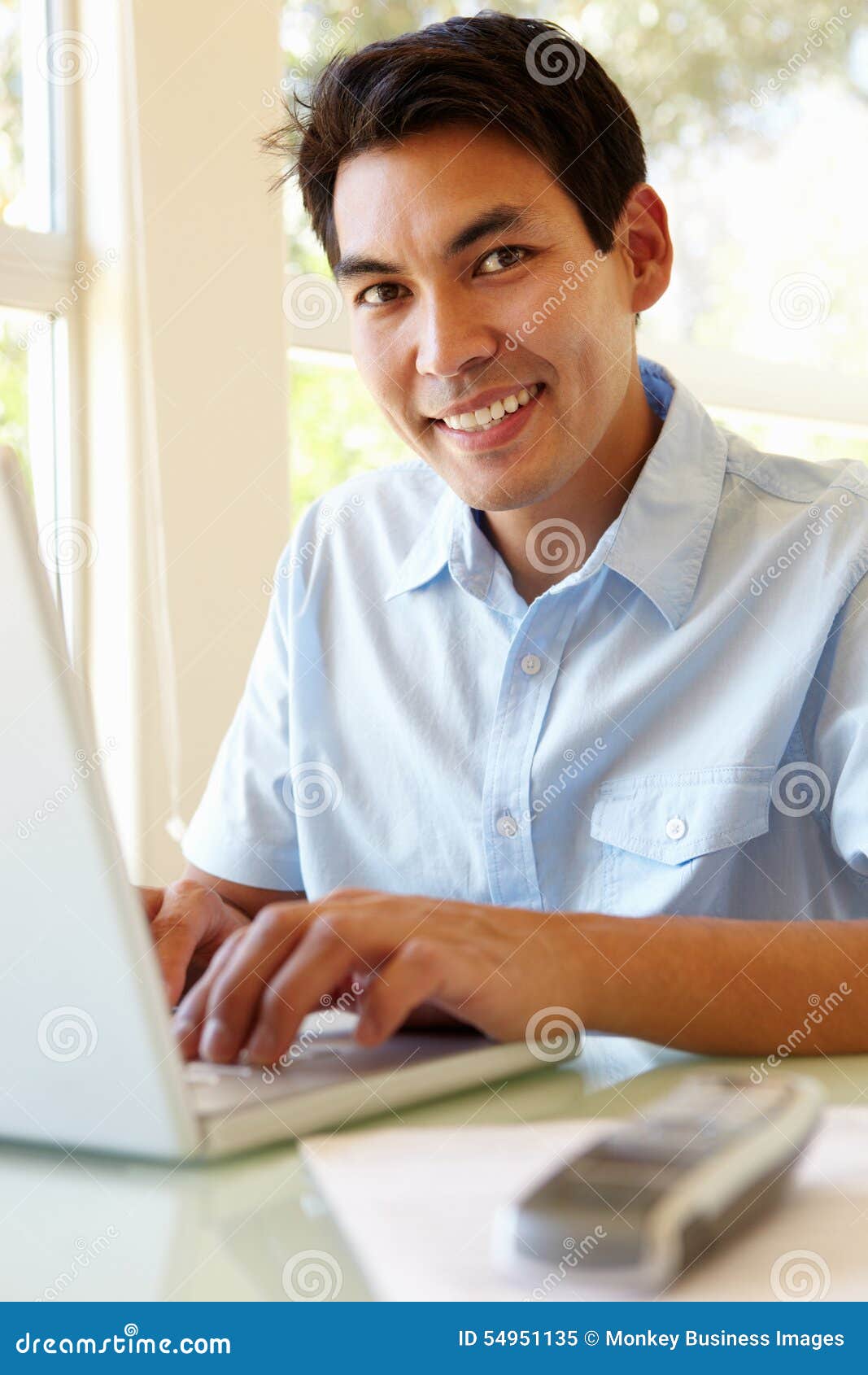 Filipino Man Working on Laptop Stock Image - Image of happy, keyboard ...