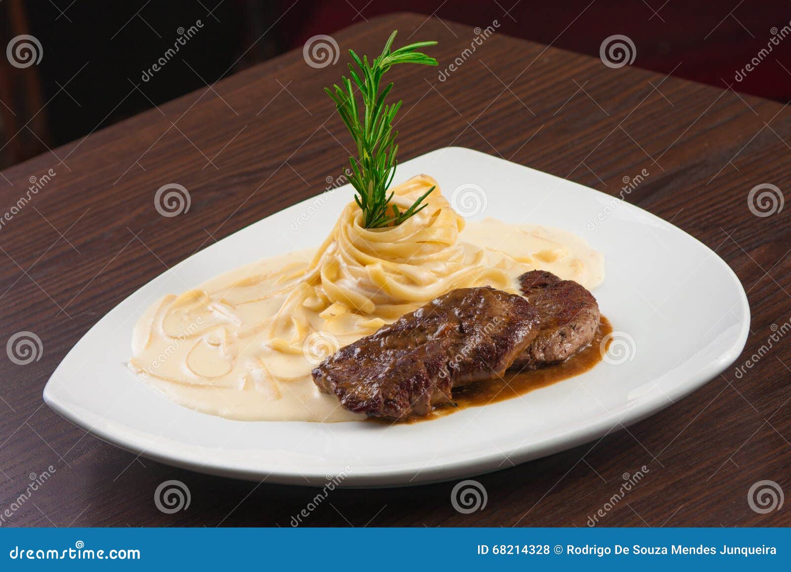 Fillet Mignon with pasta stock photo. Image of basil - 68214328