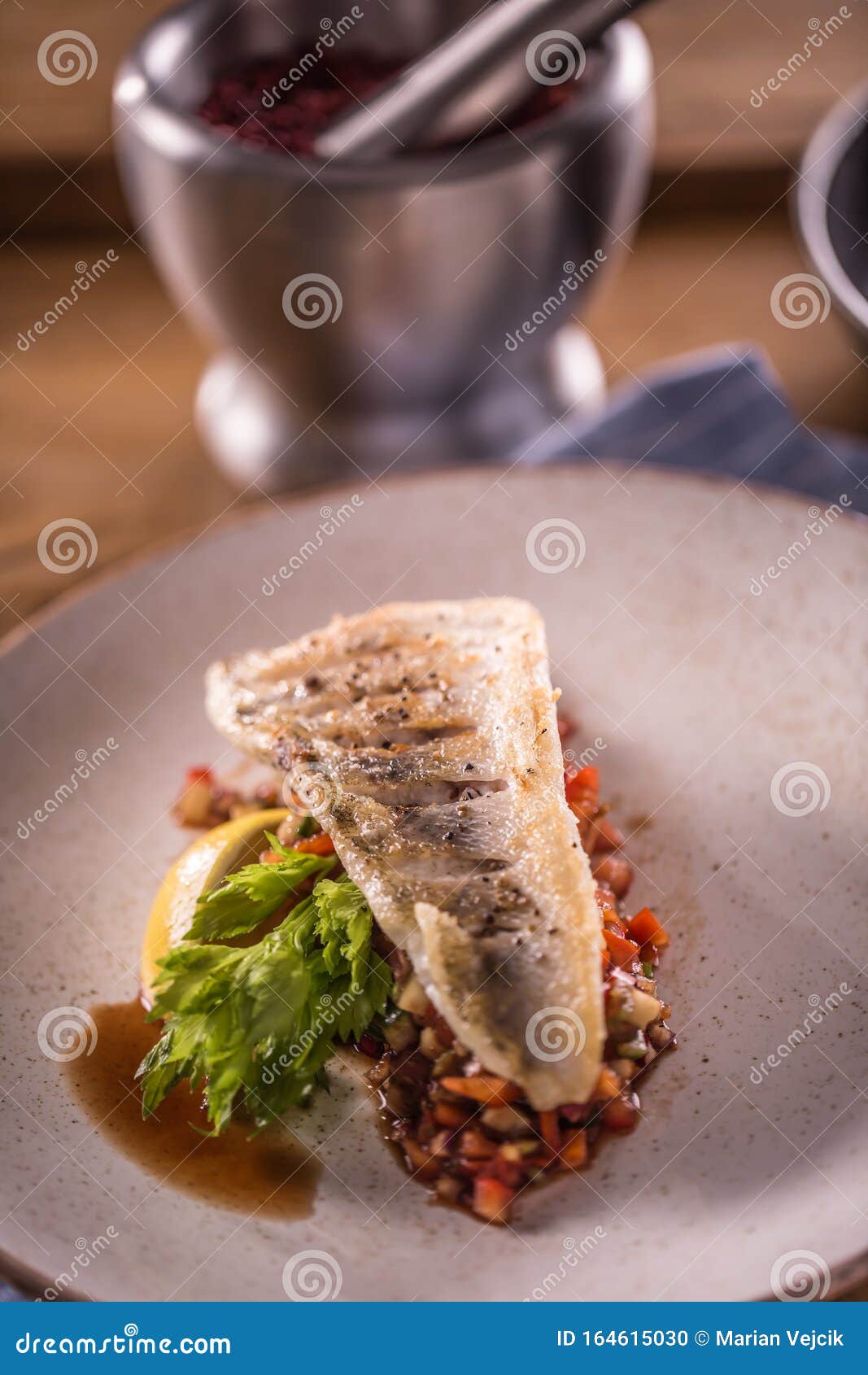 Fillet of Zander with Vegetables on a Plate in a Restaurant Stock Photo ...