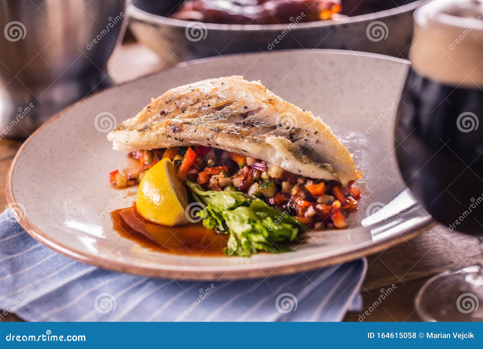 Fillet of Zander with Vegetables on a Plate in a Restaurant Stock Photo ...