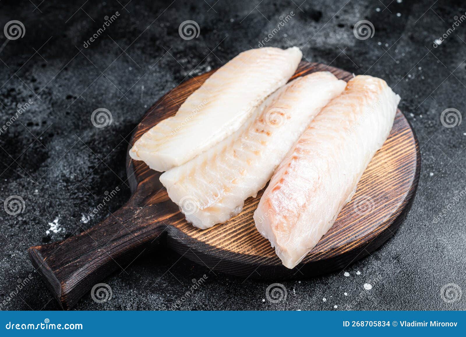 Fillets of Codfish, Raw Cod Fish Meat. Black Background Stock Photo ...