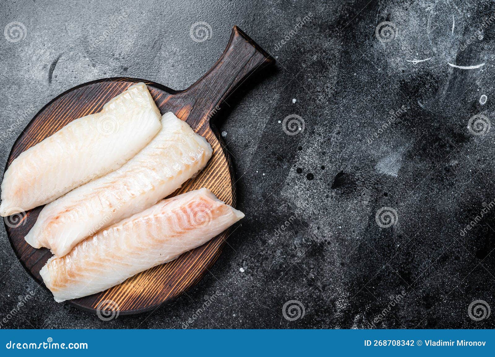 Fillets of Codfish, Raw Cod Fish Meat. Black Background. Top View Stock ...