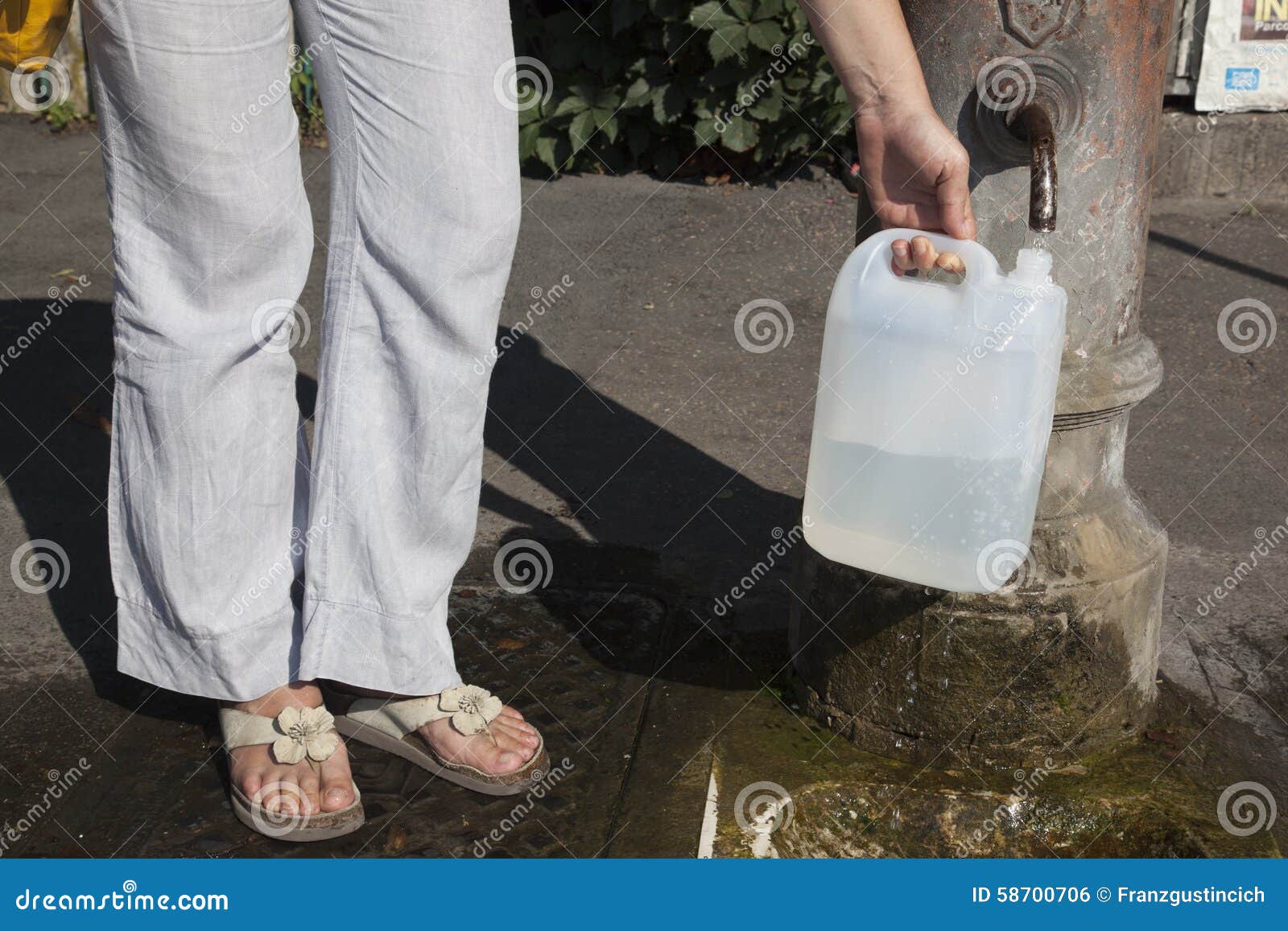 Filling Canister Public Fountain Stock Photo - Image of hold, tank ...