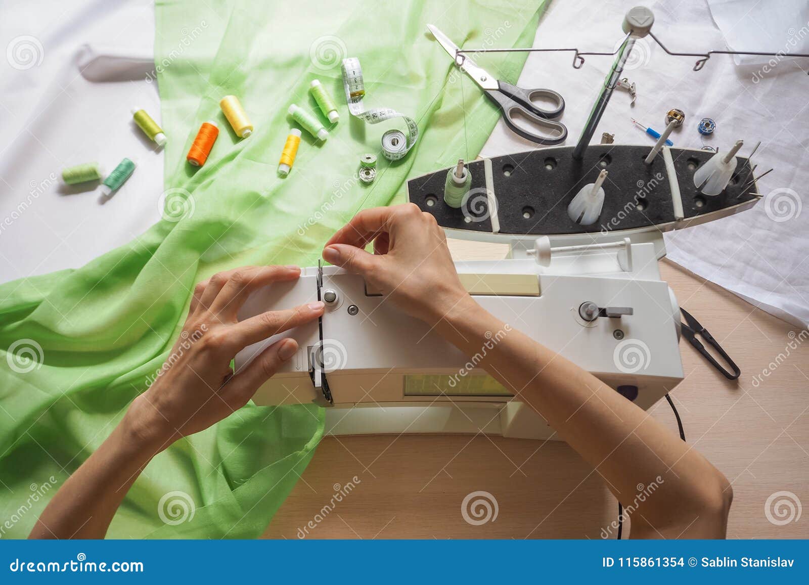 Filling the Coil Threads on the Sewing Machine. Stages of the ...