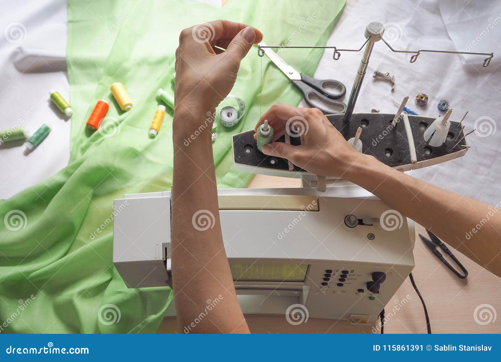 Filling the Coil Threads on the Sewing Machine. Stages of the ...