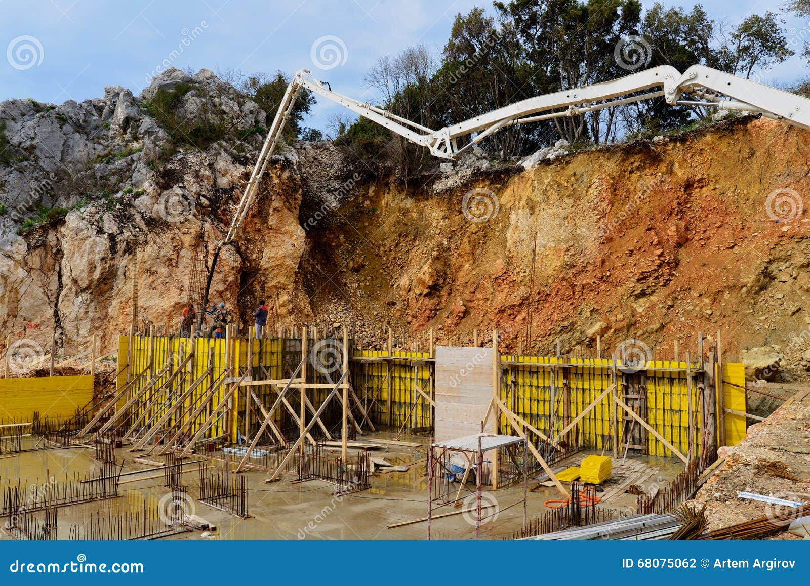Filling in the Concrete Structure of the Building Walls by Concrete ...