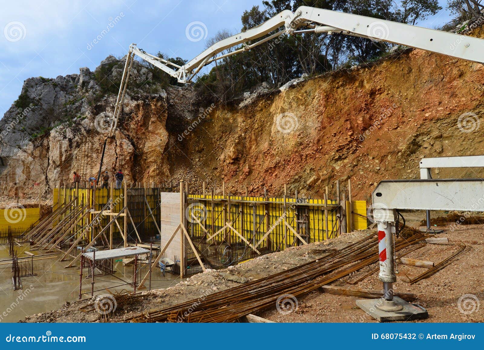Filling in the Concrete Structure of the Building Walls by Concrete ...