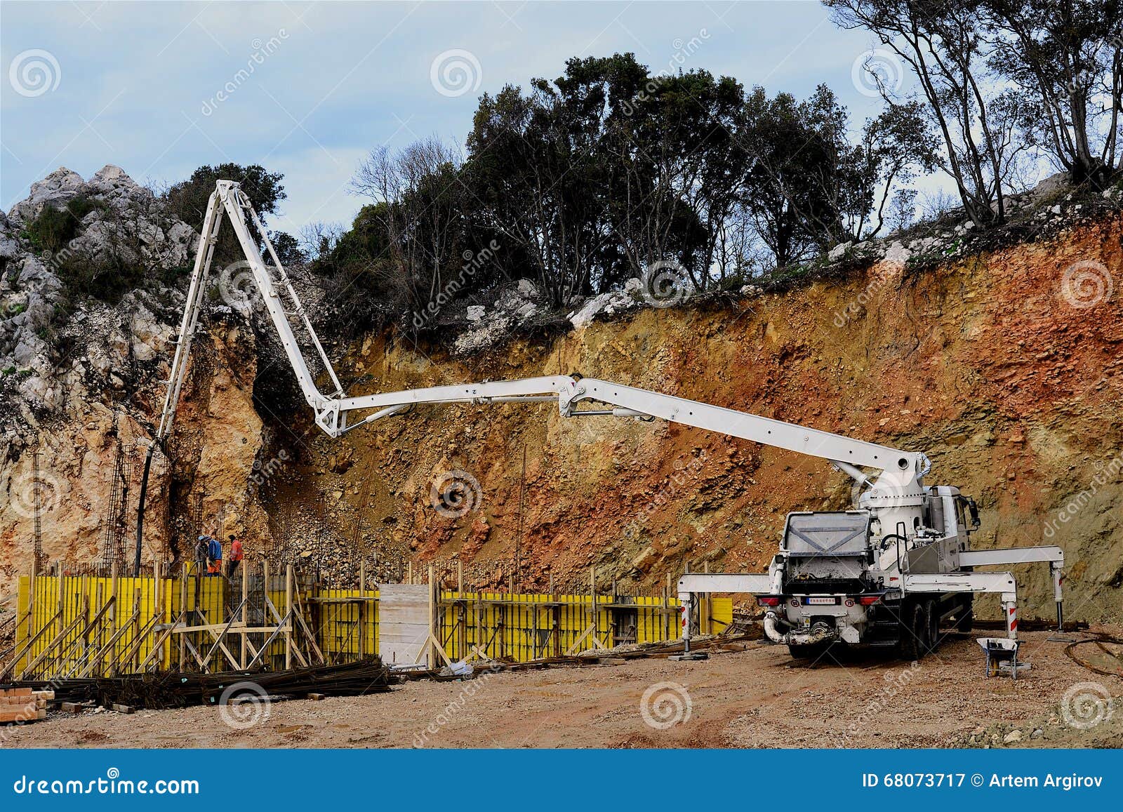 Filling in the Concrete Structure of the Building Walls by Concrete ...