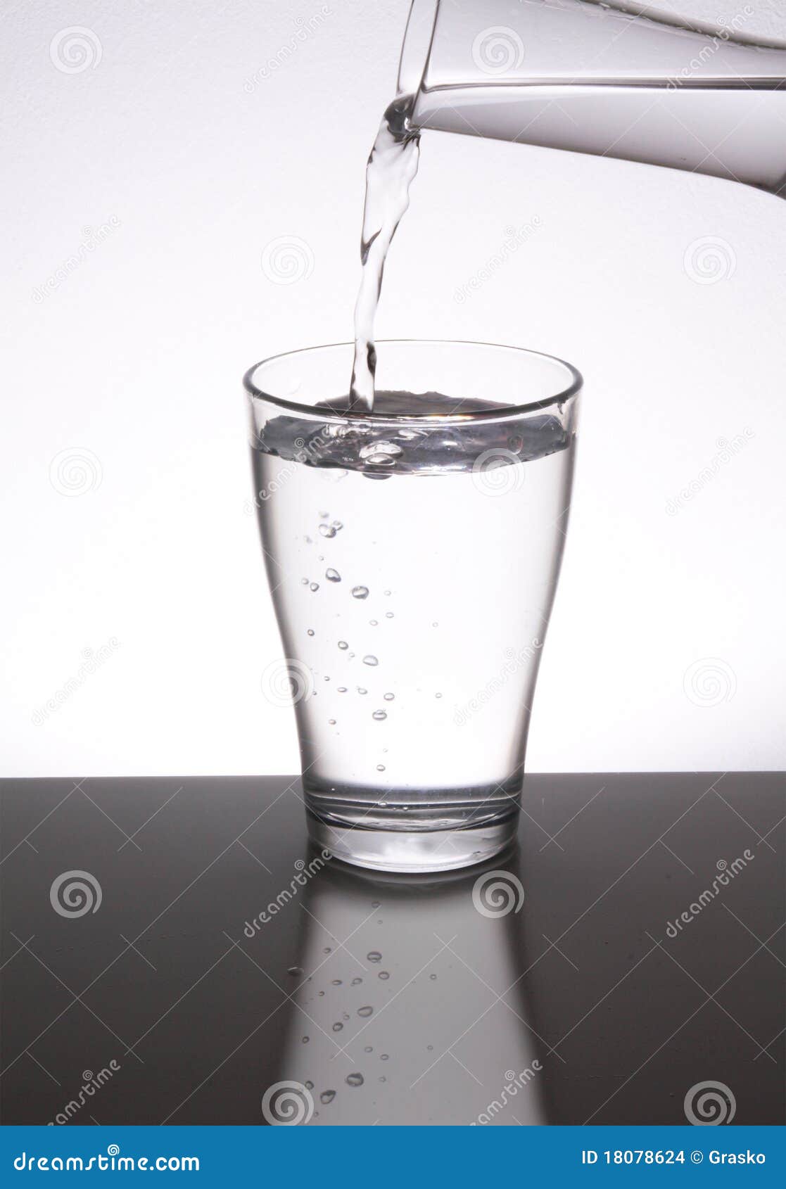 Filling a glass with water stock photo. Image of glass - 18078624
