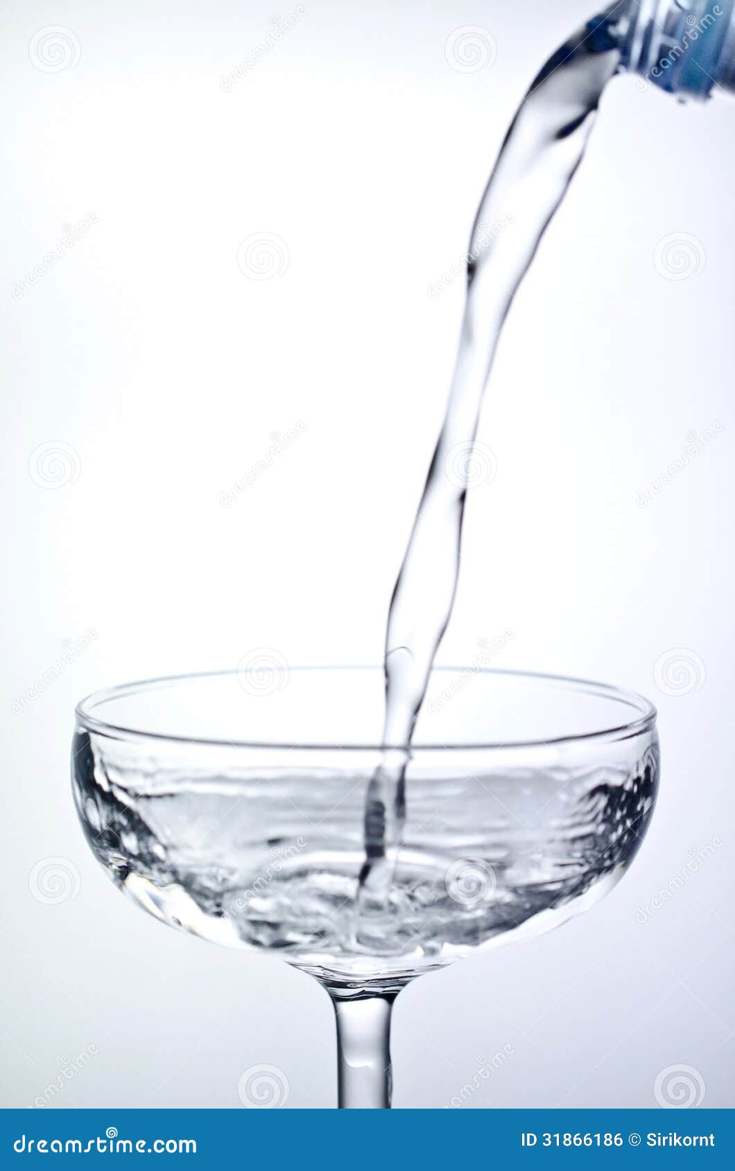 Filling a Glass with Water Showing a Drink Concept Stock Photo - Image ...