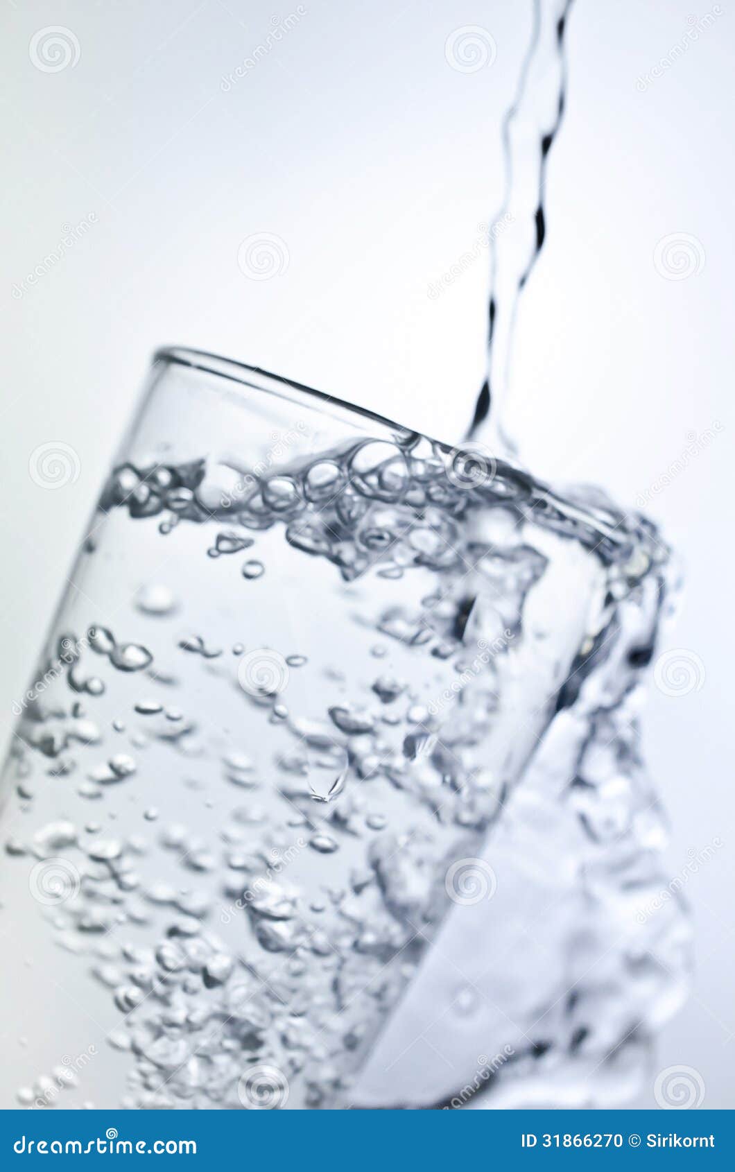 Filling a Glass with Water Showing a Drink Concept Stock Photo - Image ...
