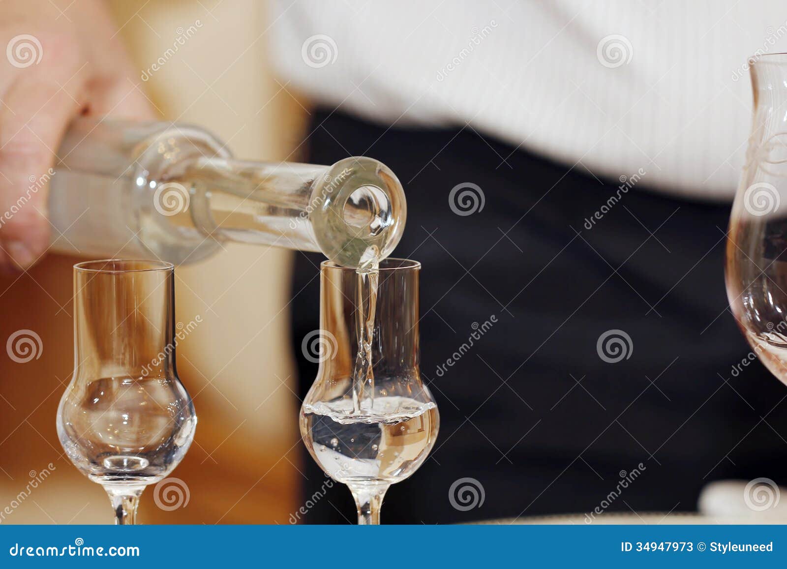 Filling glasses stock image. Image of glassware, resort - 34947973
