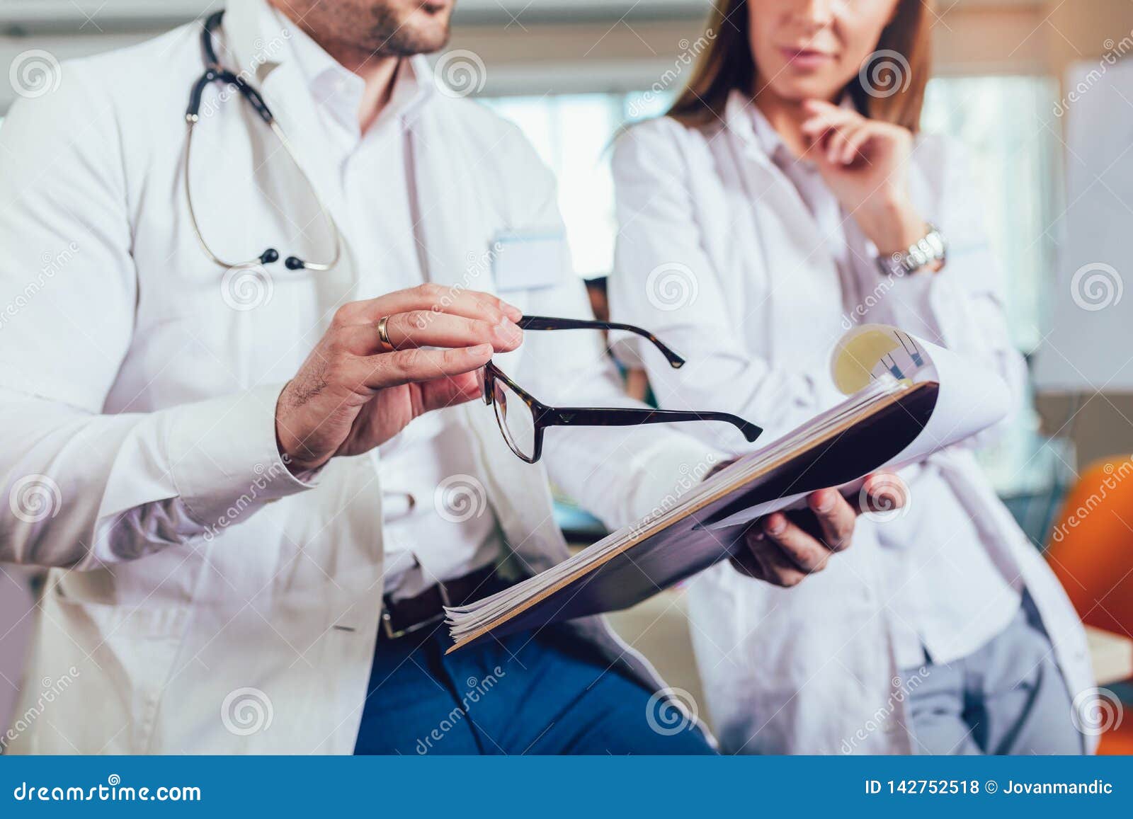 Doctors Discussing about Medical Case Stock Photo - Image of doctor ...