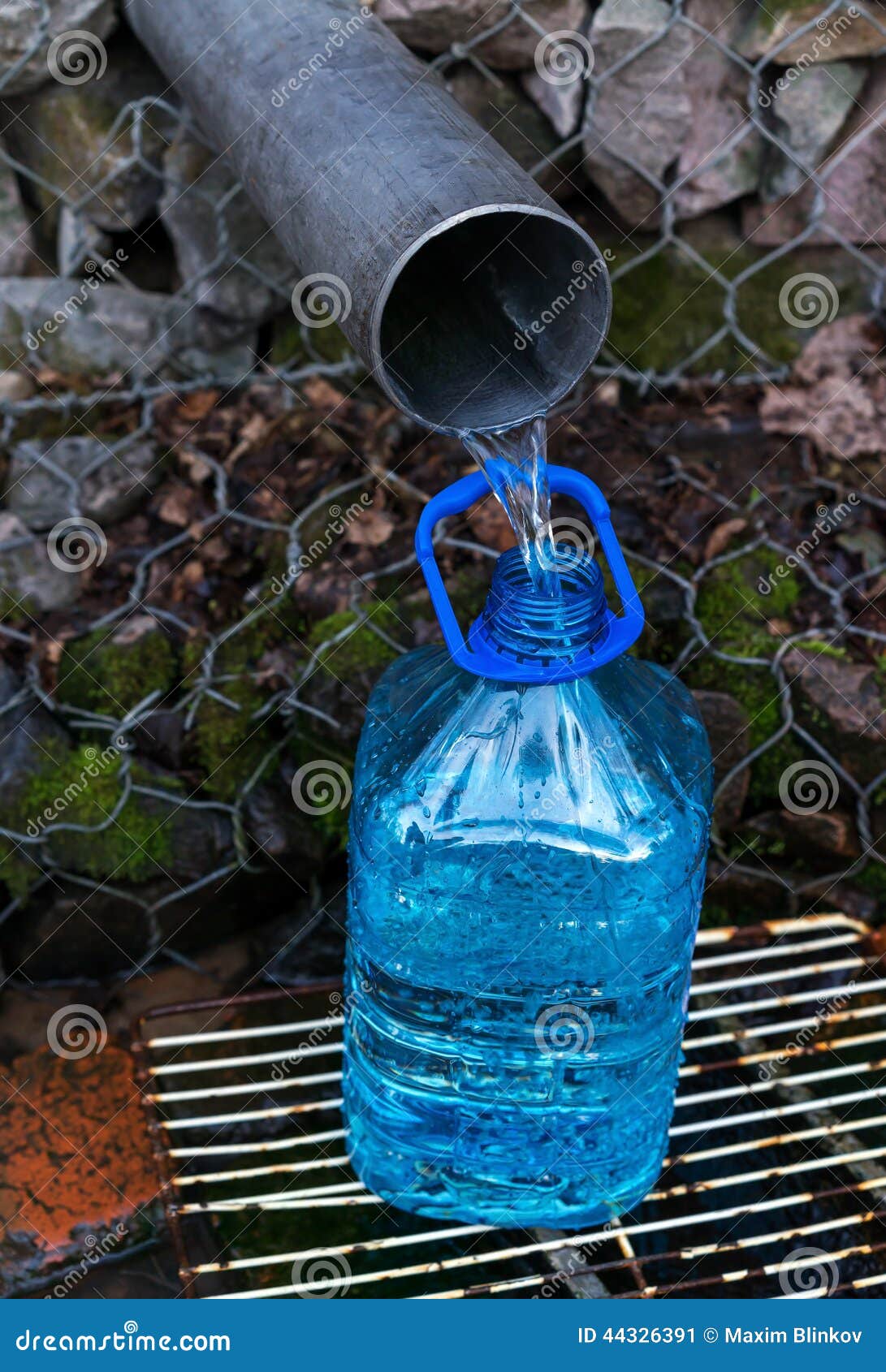Filling of a Plastic Bottle in Source Stock Image - Image of metall ...