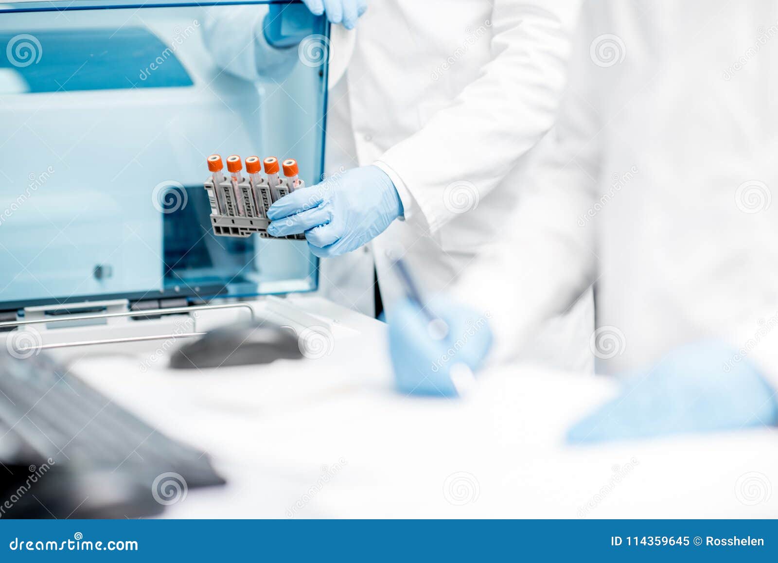 Filling Test Tubes into the Analyzer Machine Stock Image - Image of ...