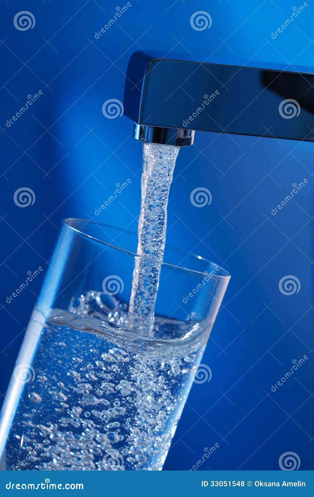 Filling Up a Glass of Water . Stock Photo - Image of background ...