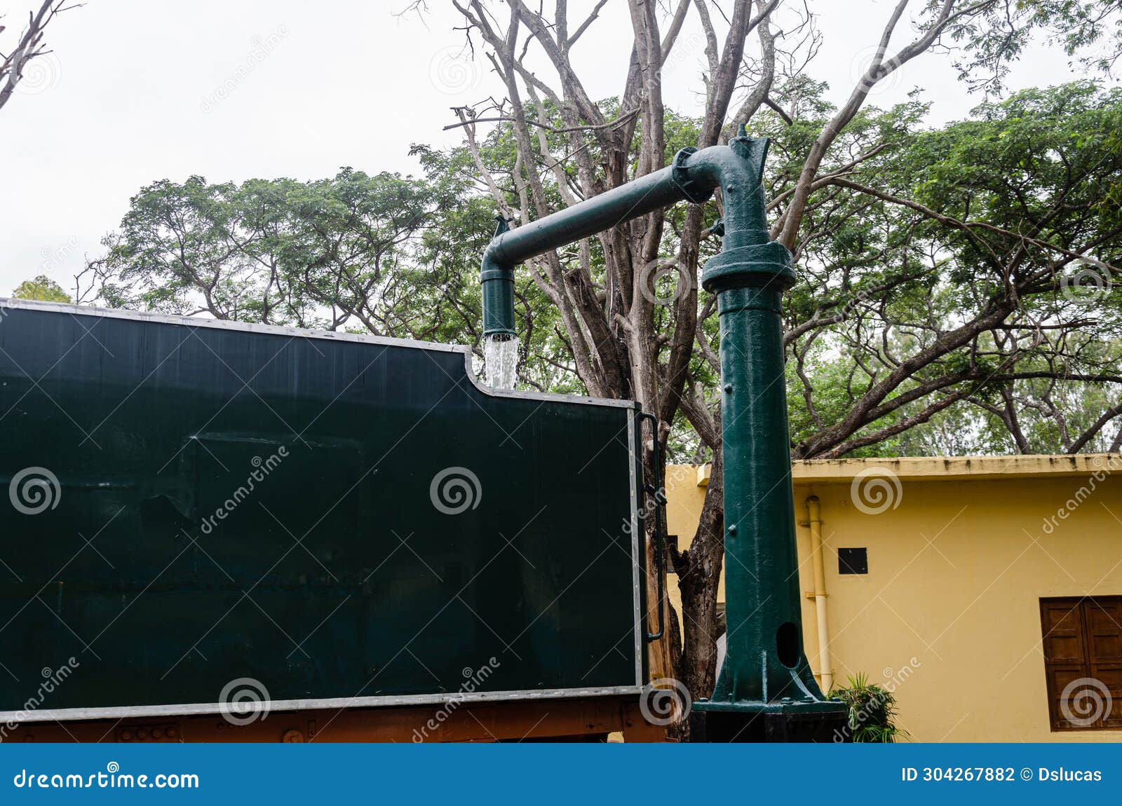 Filling Water To an Old Locomotive Steam Engine Stock Photo - Image of ...