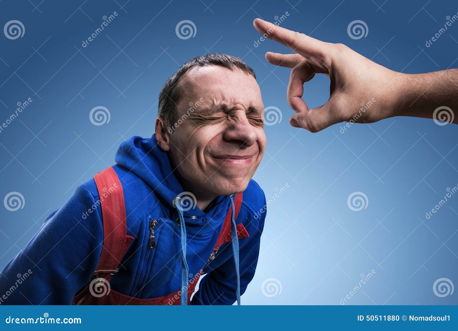 Fillip on forehead stock photo. Image of ache, face, gesture - 50511880
