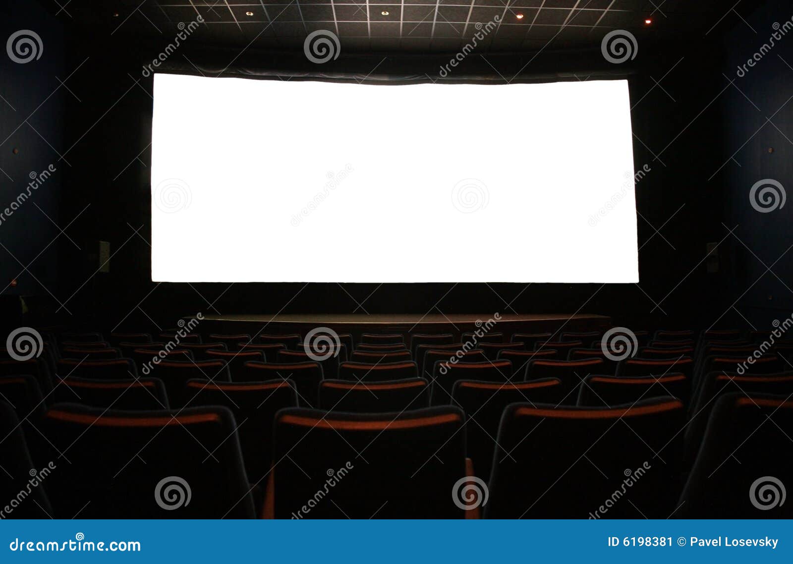 Film screen in dark cinema stock image. Image of auditorium - 6198381