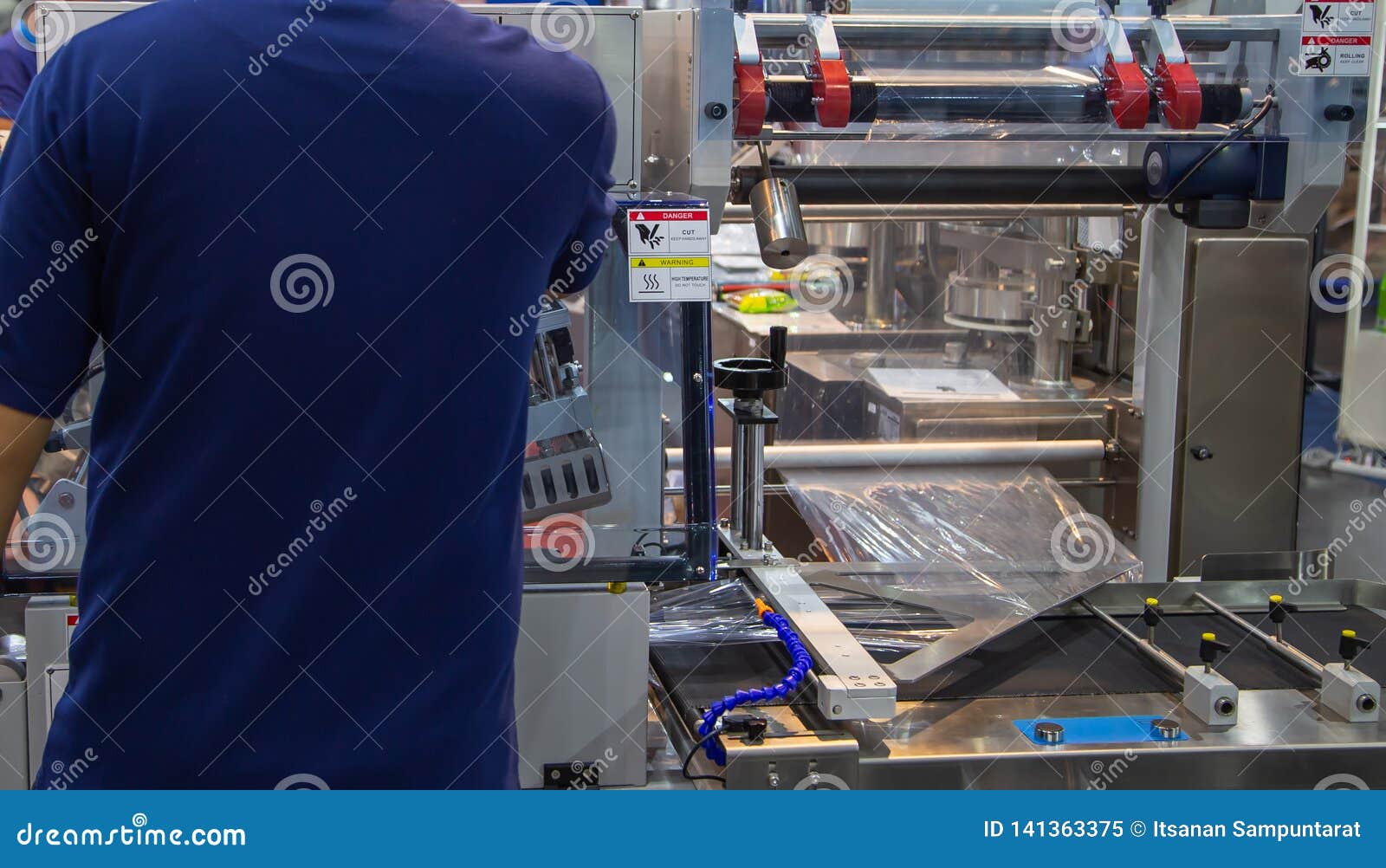 Film wrapping machine stock image. Image of sealer, plastic - 141363375