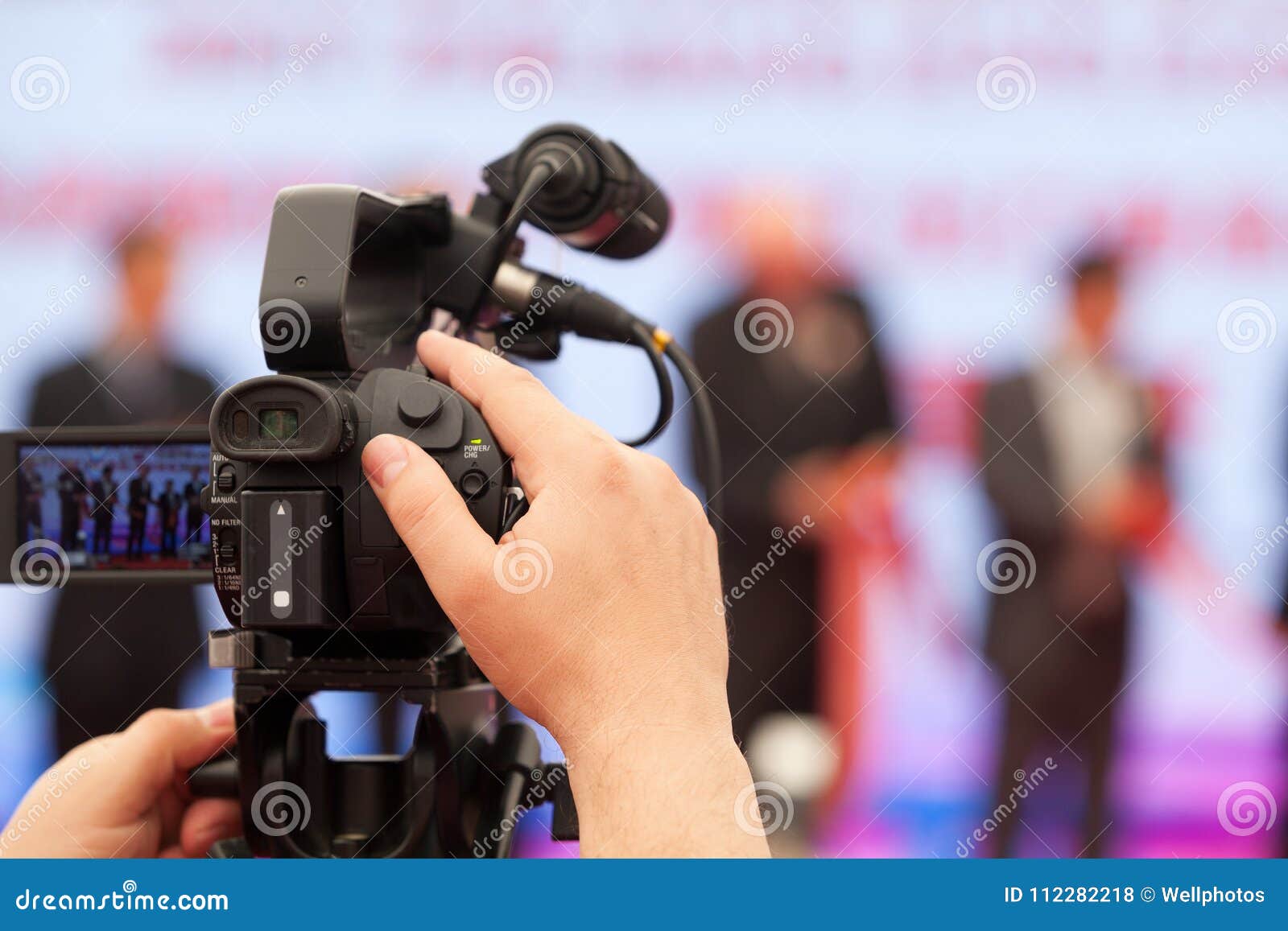 Filming an Media Event with a Video Camera Stock Photo - Image of news ...