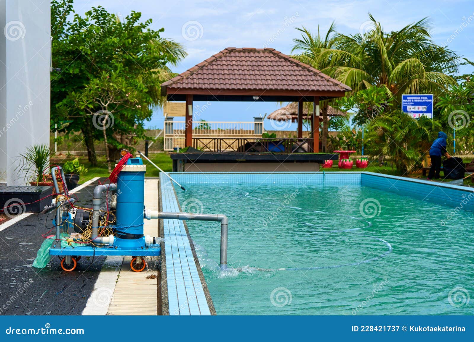 A Filter Pump Cleans the Pool Water. Device for Automatic Cleaning of ...