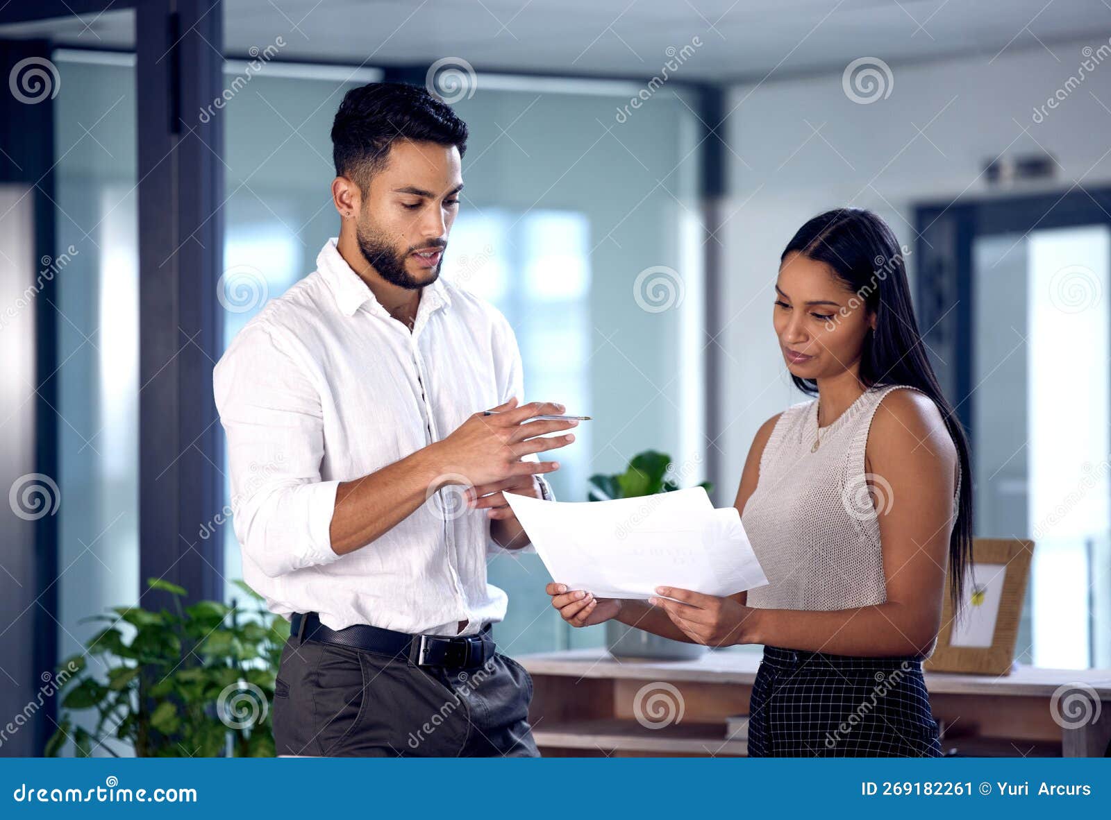 This is the Final Draft of My Project. Two Work Colleagues Reading Over ...