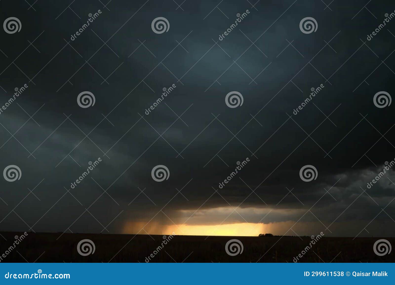 Twilight Tempest: Sunset Silhouetted by Darkened Clouds Stock Photo ...