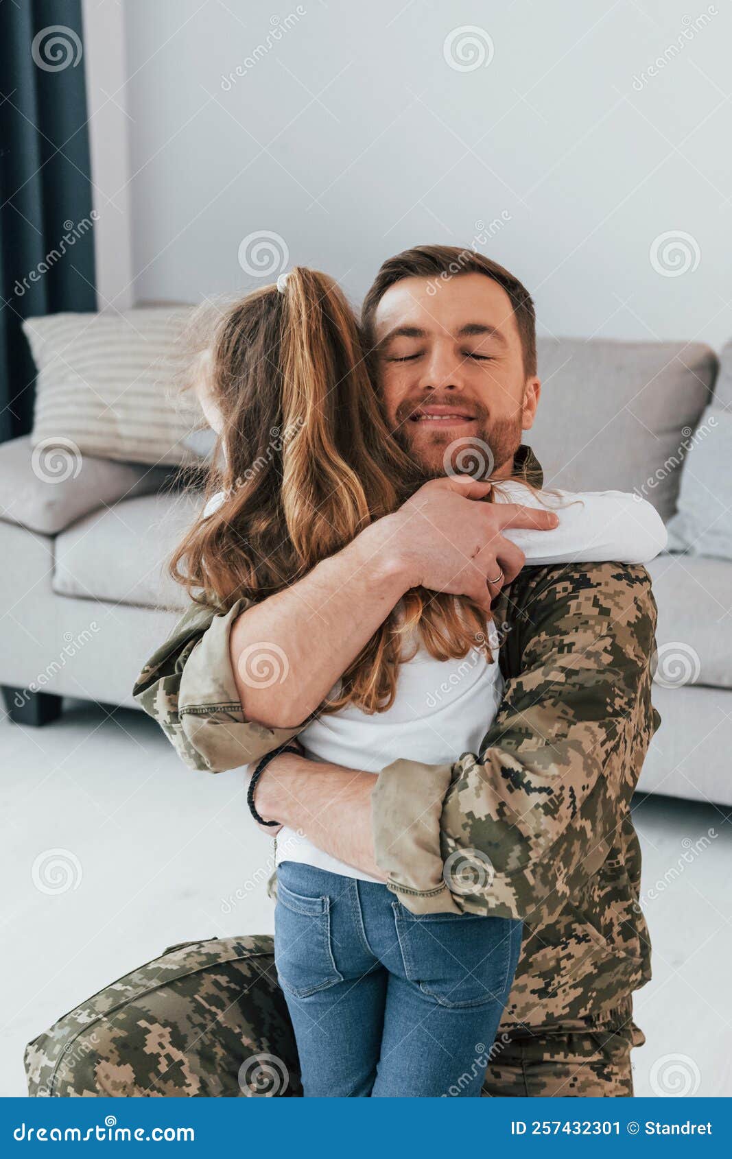 Finally at Home. Soldier in Uniform is with His Little Daughter Stock ...
