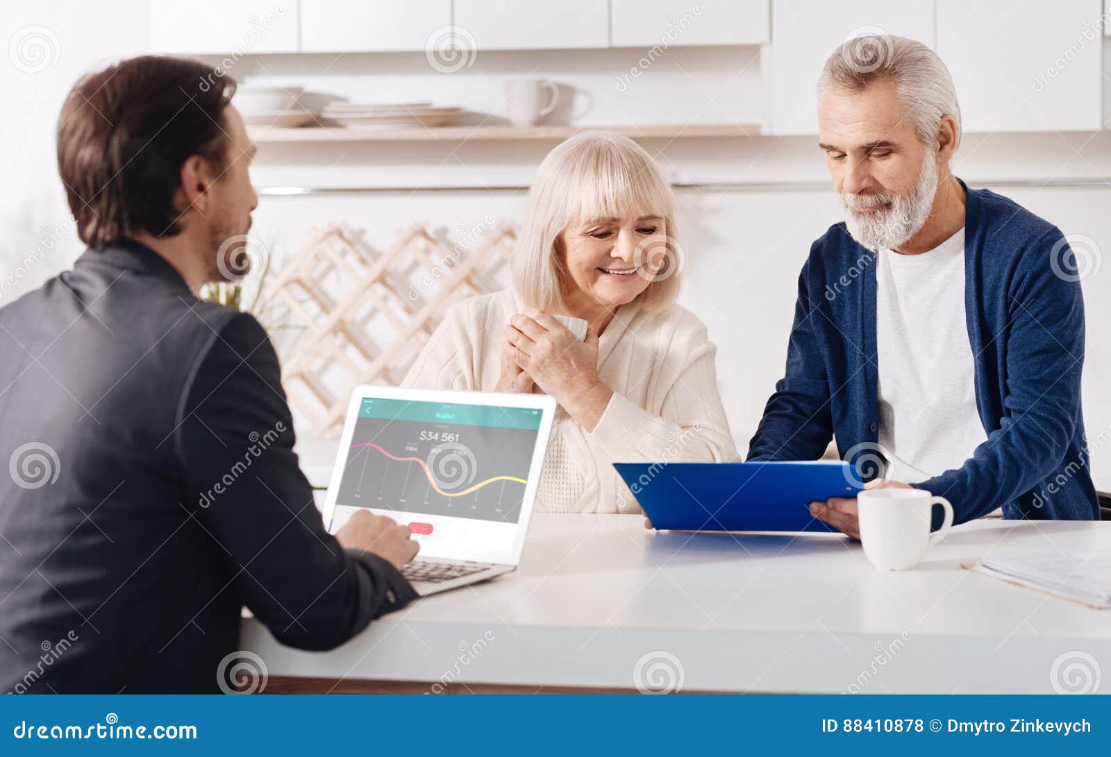 Finance Advisor Working with Aged Couple in the House Stock Photo ...