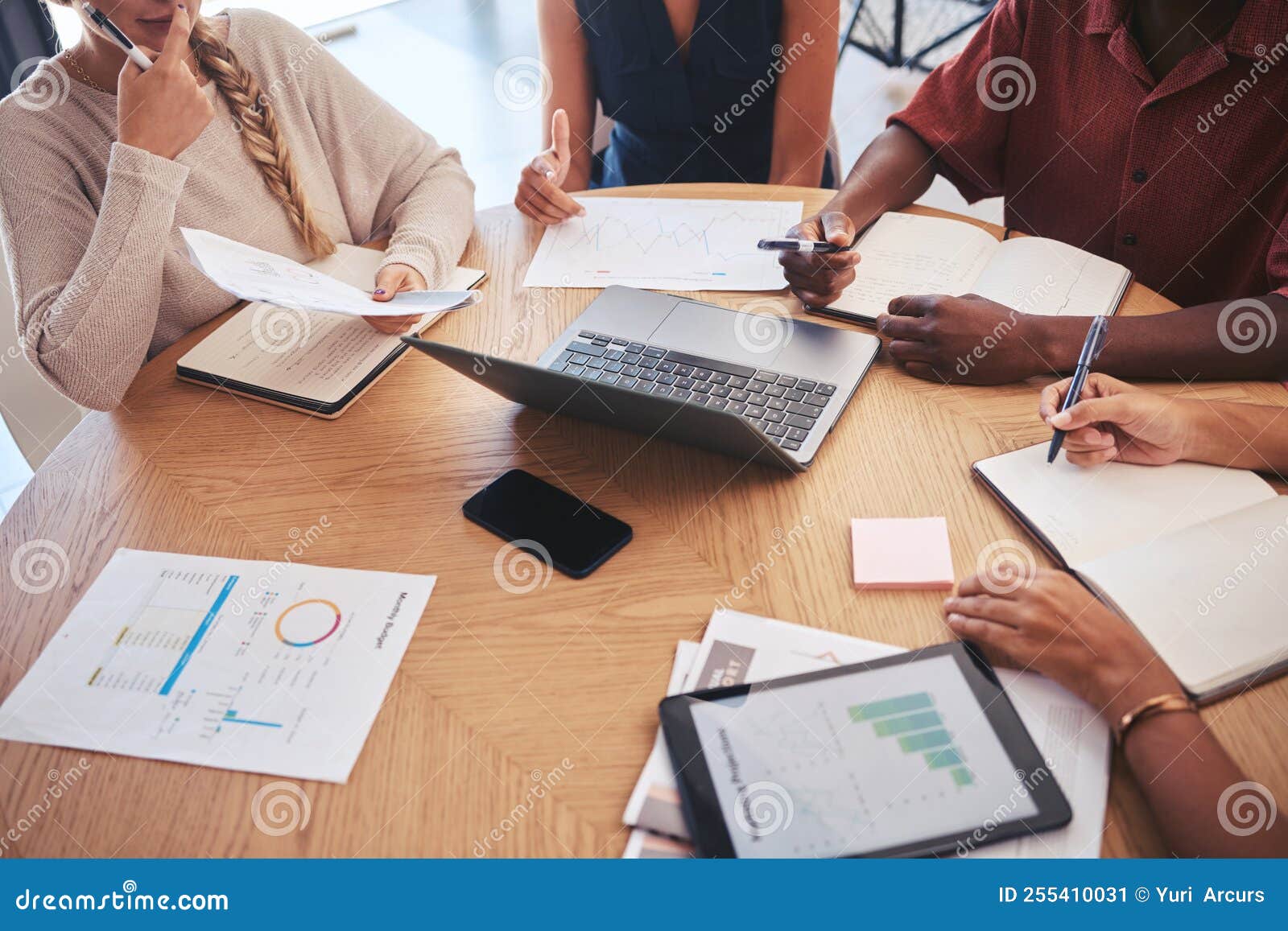 Finance, Laptop and Chart with a Team Working in Collaboration during a ...