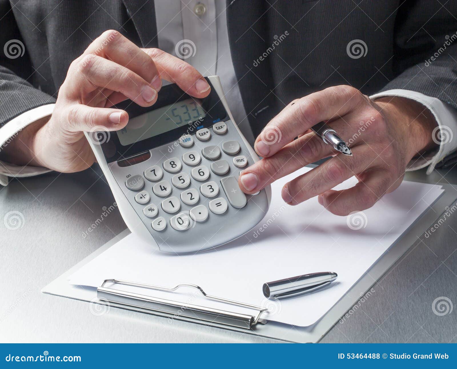 Finance Manager Counting with Focus on Calculator Stock Photo - Image ...