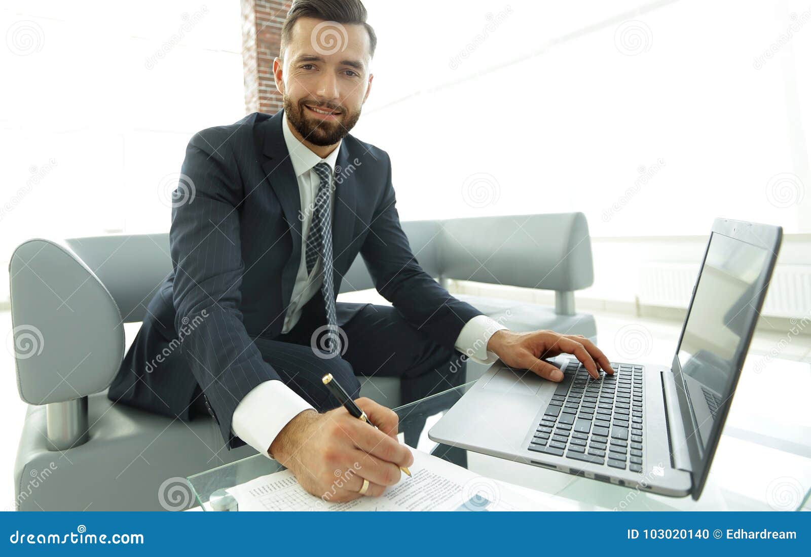 Finance Manager Working with Business Graphics on a Laptop Stock Photo ...