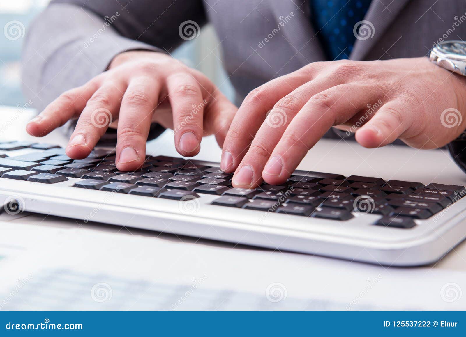 The Finance Professional Working on Keyboard with Reports Stock Photo ...