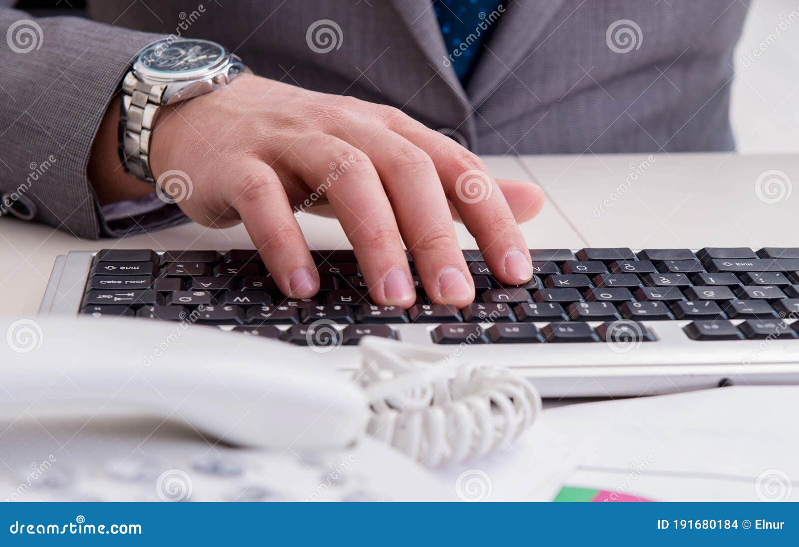 Finance Professional Working on Keyboard with Reports Stock Photo ...