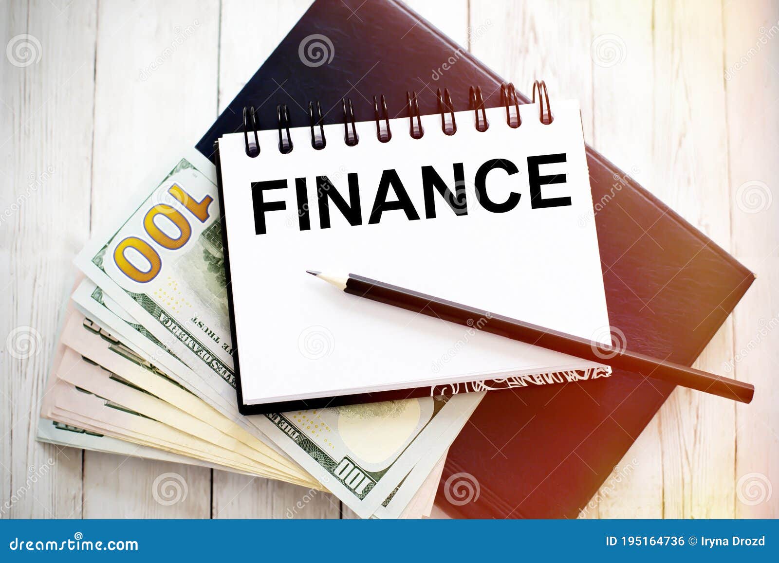 FINANCE Text Written on Notebook with Dollar Bills and Pencil Stock ...