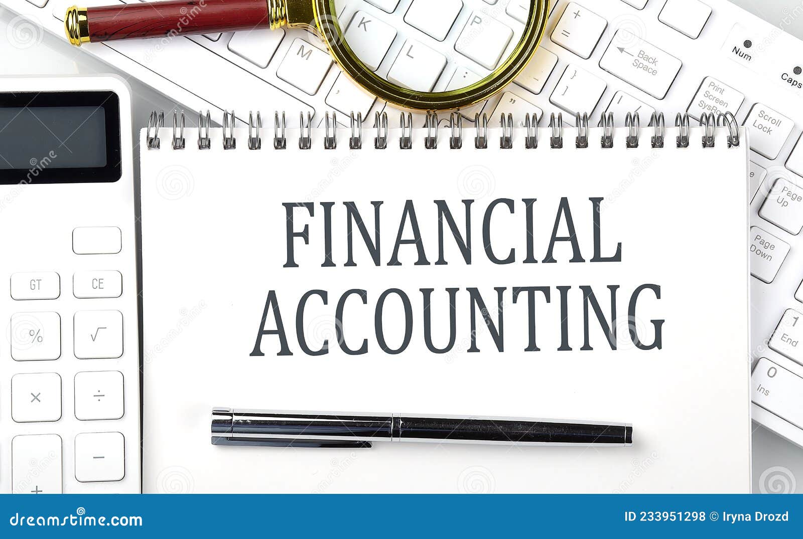 FINANCIAL ACCOUNTING Text on Notepad with Calculator and Keyboard ...