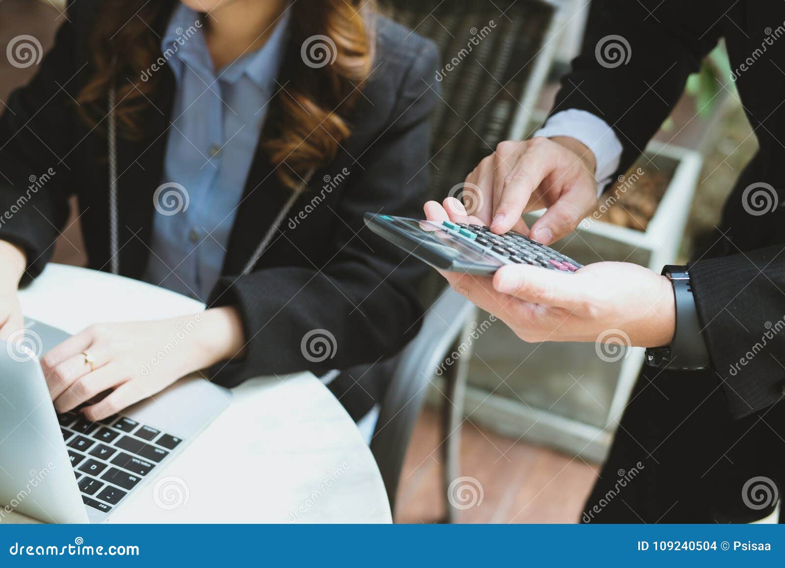 Financial Adviser Working with Calculator & Computer at Office. Stock ...