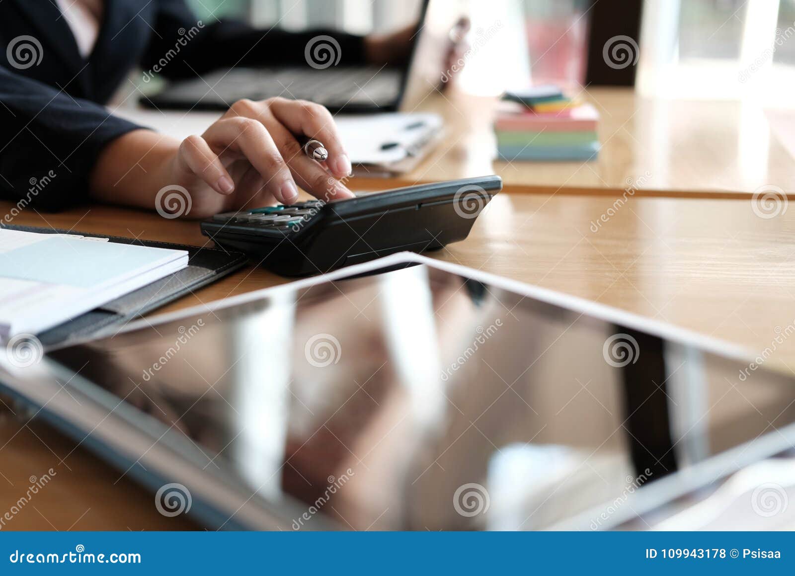 Financial Adviser Working with Calculator & Computer at Office. Stock ...