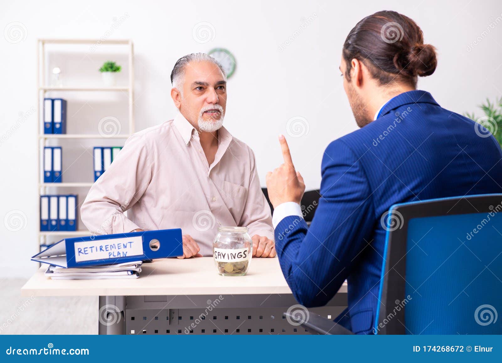 Financial Advisor Giving Retirement Advice To Old Man Stock Photo ...