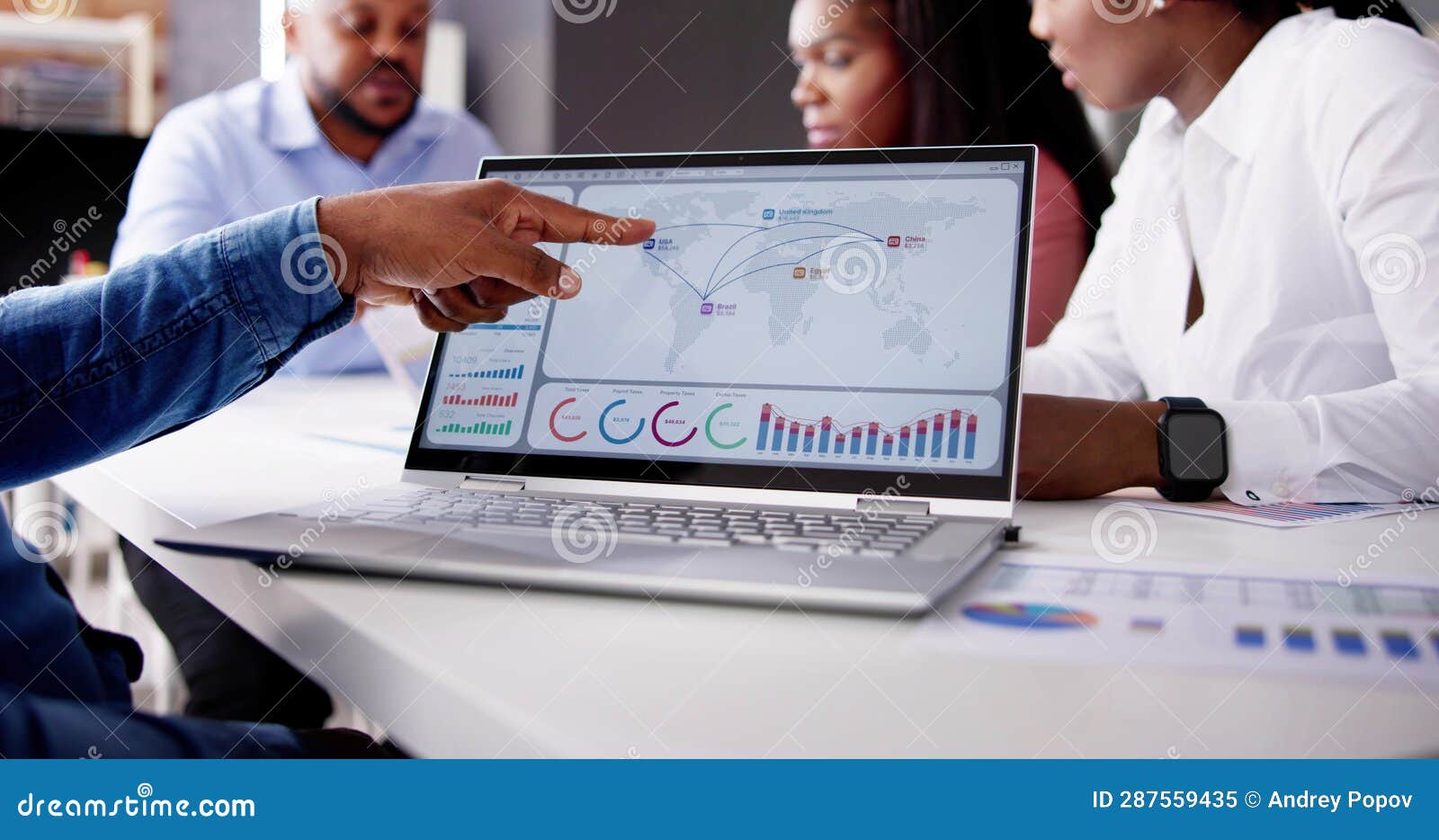 Financial Advisor Group Meeting Examining Analytics Stock Image - Image ...