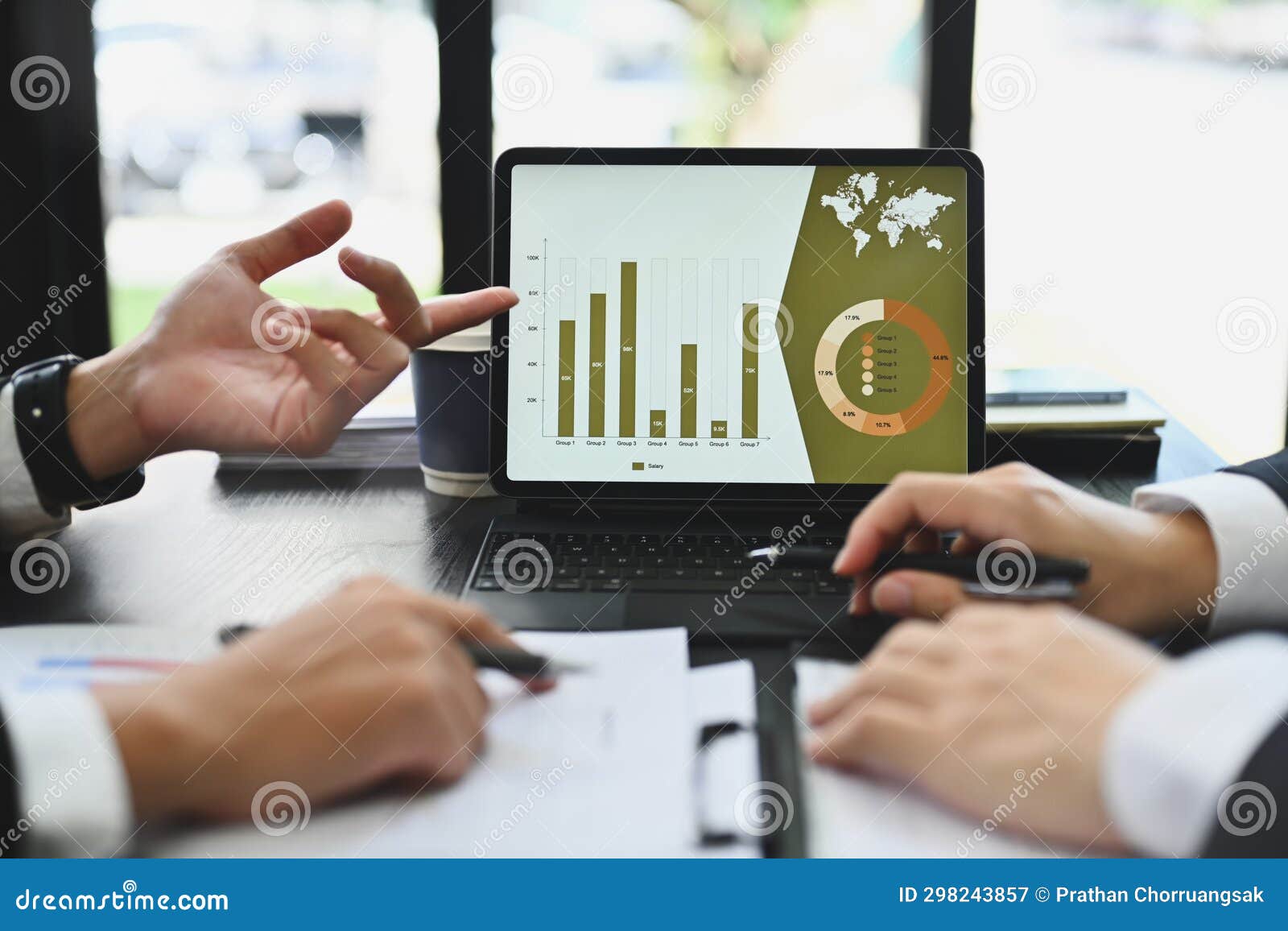 Financial Advisor Pointing Statistics Chart on Digital Tablet and ...