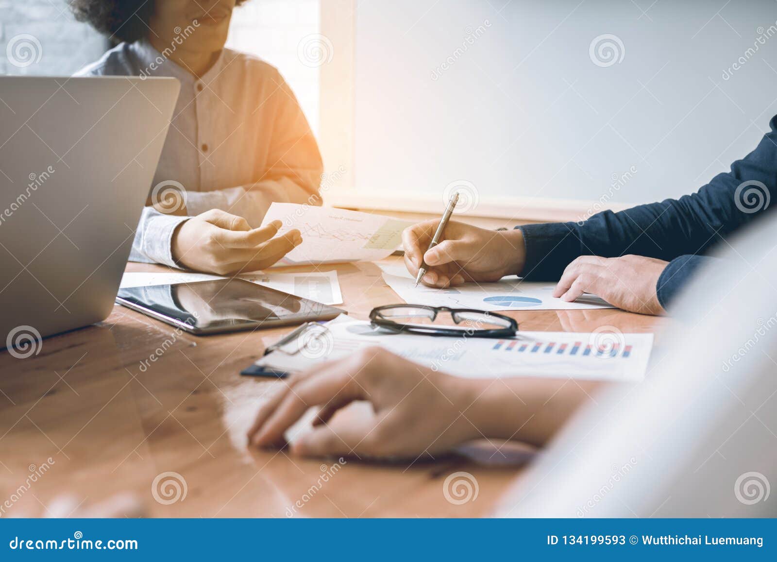 Financial Advisor Presenting Graph Document Report and Discussion about ...