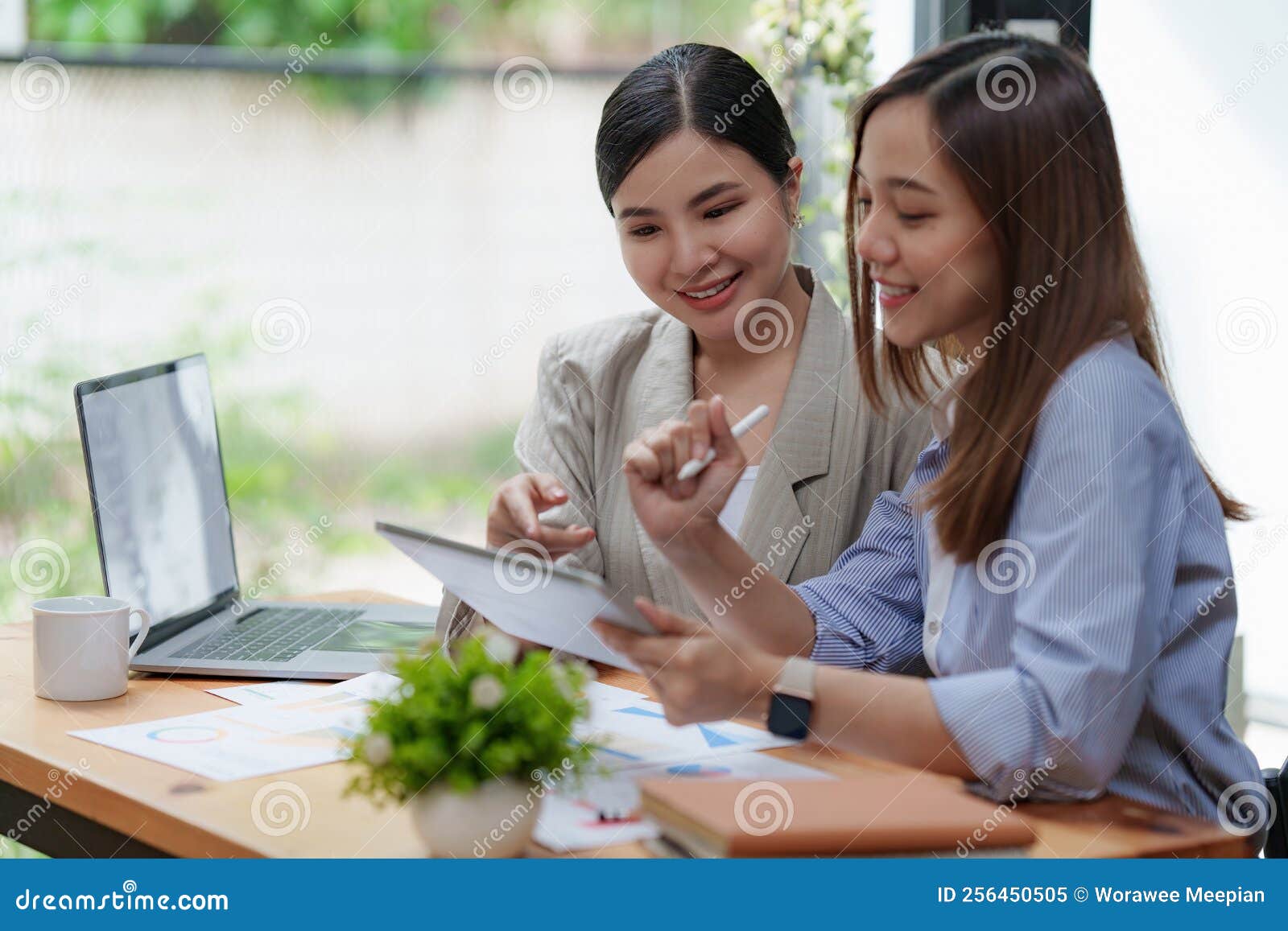 Financial Analyst Discussing with Investment Banker at Meeting Room ... Financial Analyst Discussing with Investment Banker at Meeting Room ...