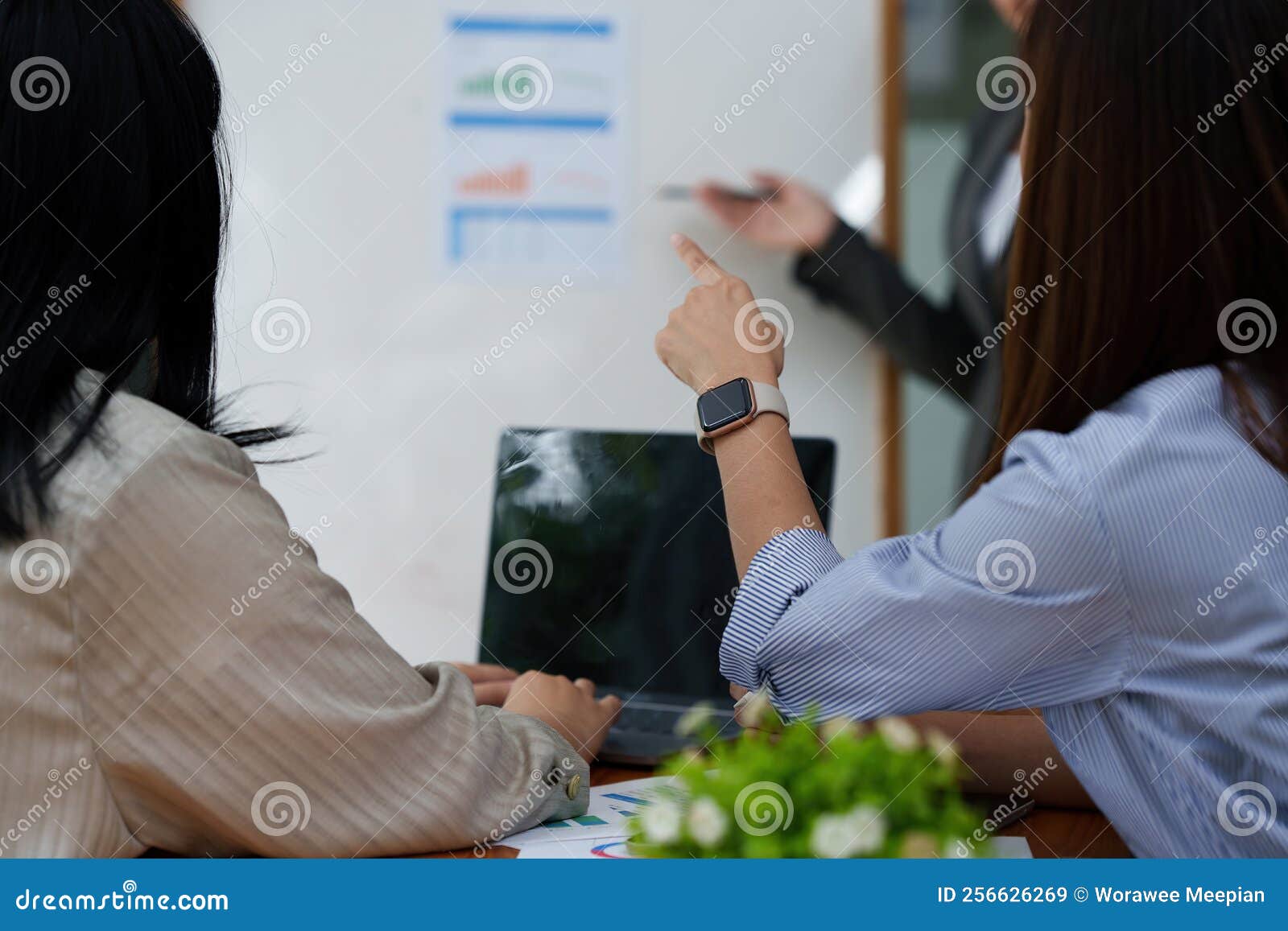 Financial Analyst Discussing with Investment Banker at Meeting Room ... Financial Analyst Discussing with Investment Banker at Meeting Room ...