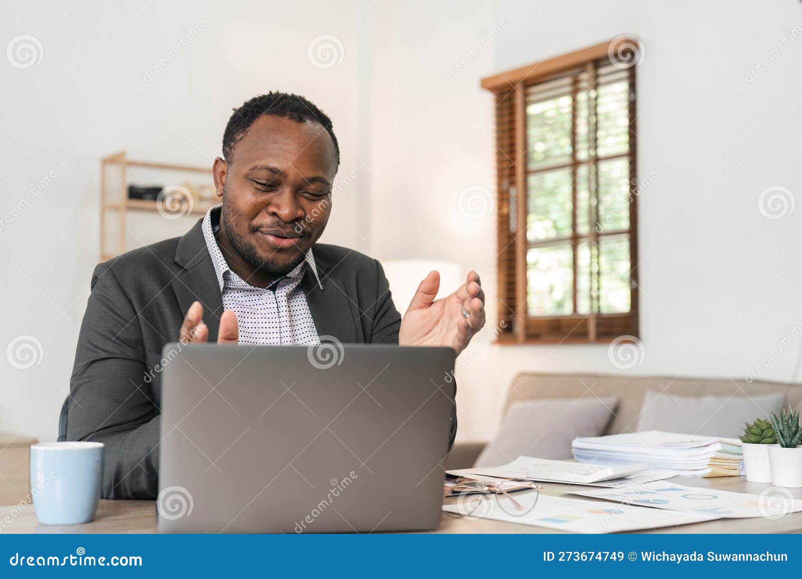Financial Analyst Using Laptop To Attend Video Call Meeting in ...