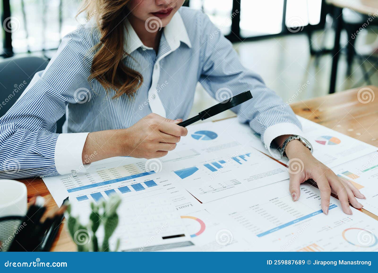 Financial Analysts Analyzing Business Financial Reports are Examining ...